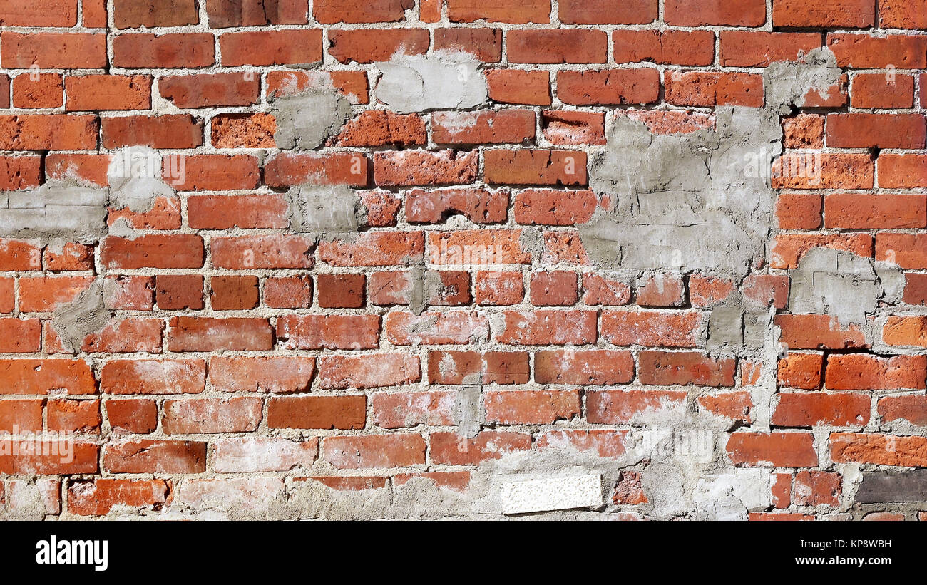 Poorly repaired and patched up Brick Wall Stock Photo - Alamy