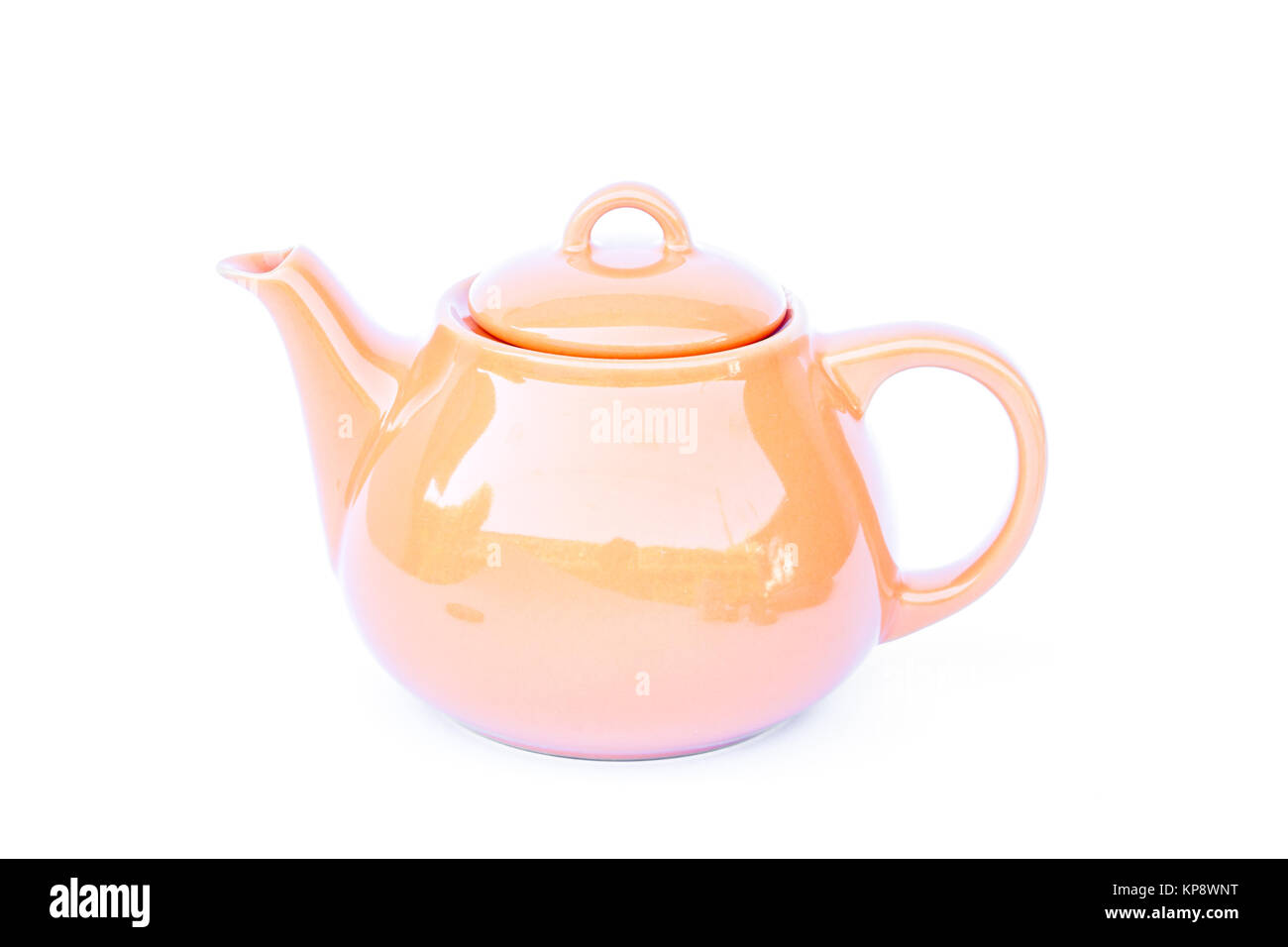 Orange ceramic teapot isolated on white background Stock Photo - Alamy