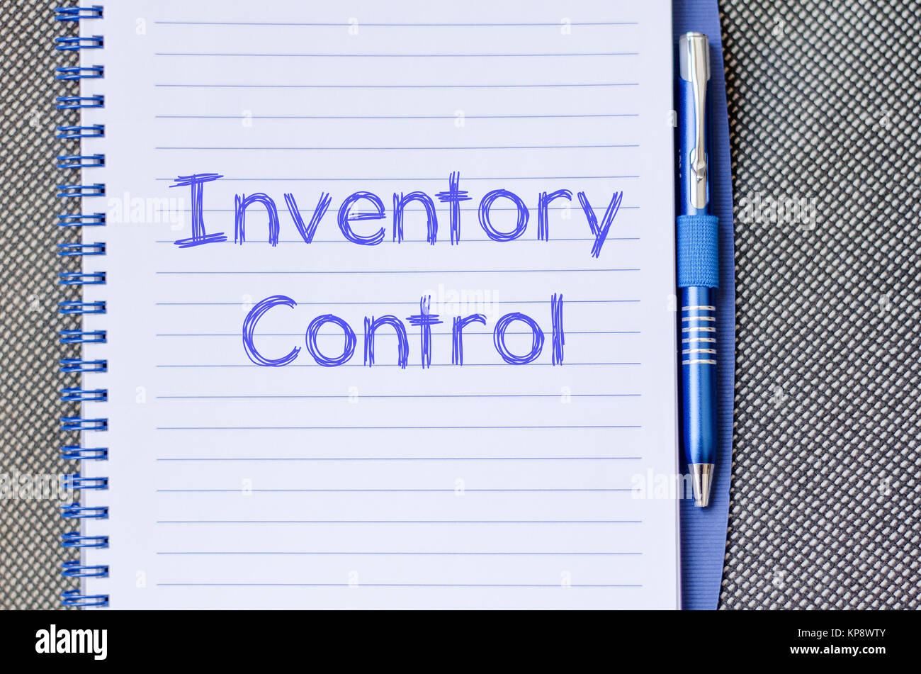 Inventory control write on notebook Stock Photo - Alamy