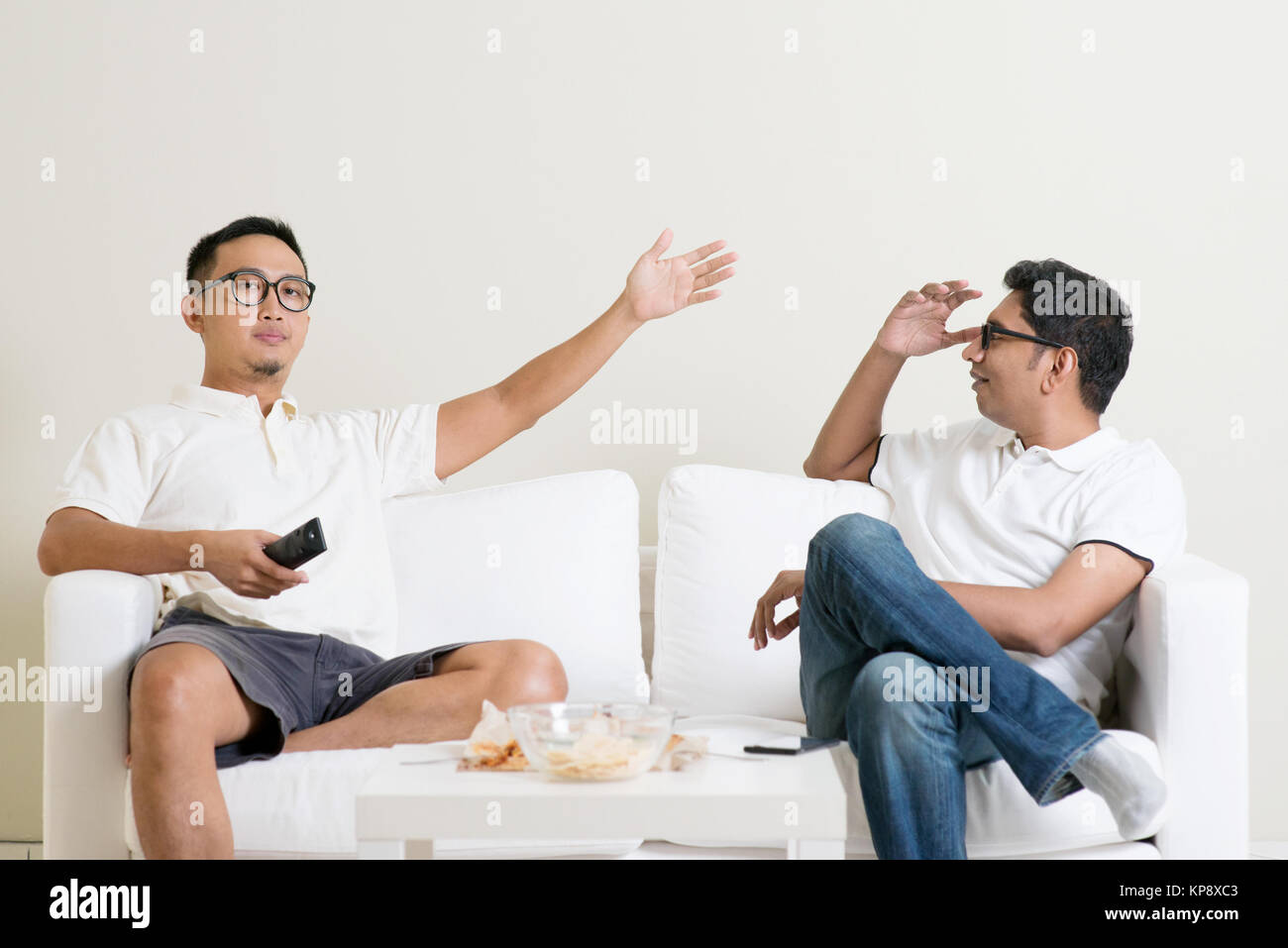 Male friends arguing Stock Photo - Alamy