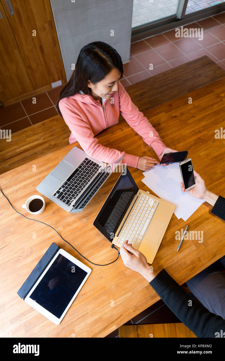 Two people use cellphone for connecting data Stock Photo - Alamy