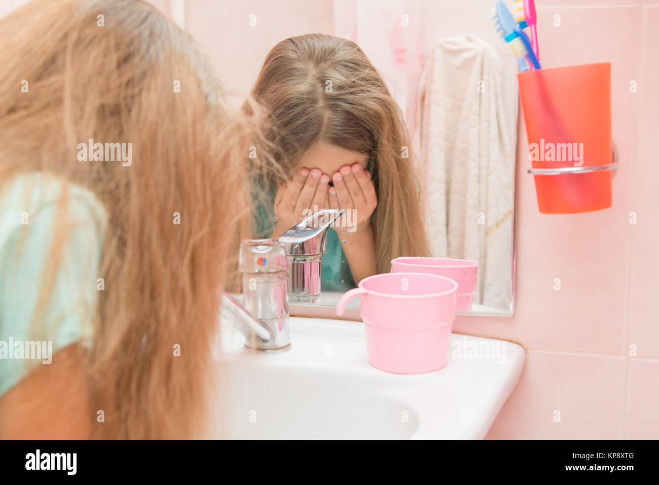 Child eye wash water in the bathroom Stock Photo - Alamy