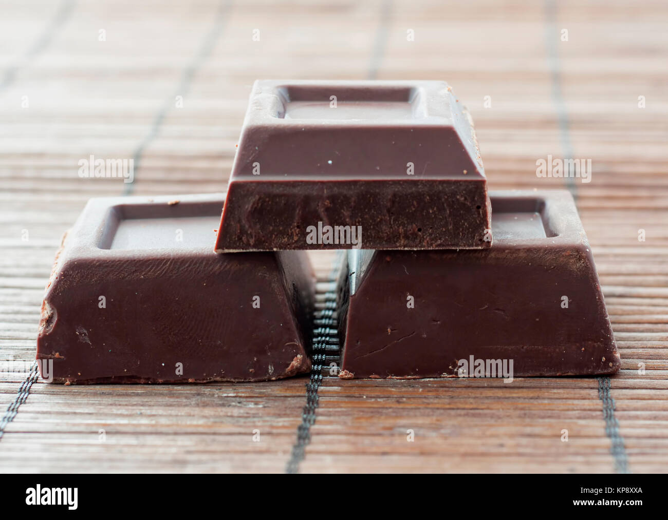 Three blocks of chocolate Stock Photo - Alamy