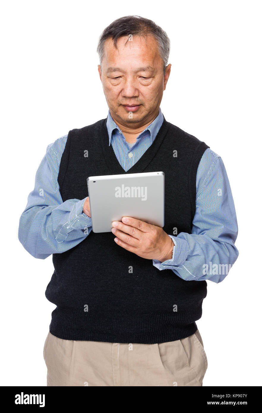 Old man use of digital tablet Stock Photo - Alamy