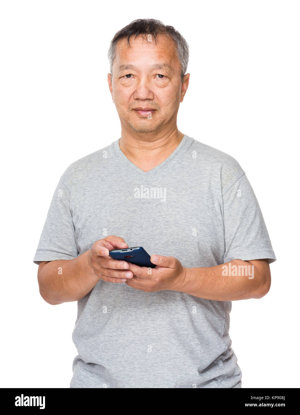 Asian old man use of mobile phone Stock Photo - Alamy