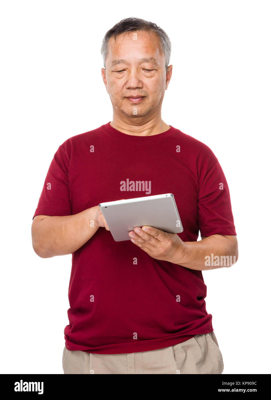 Old man use of tablet Stock Photo - Alamy