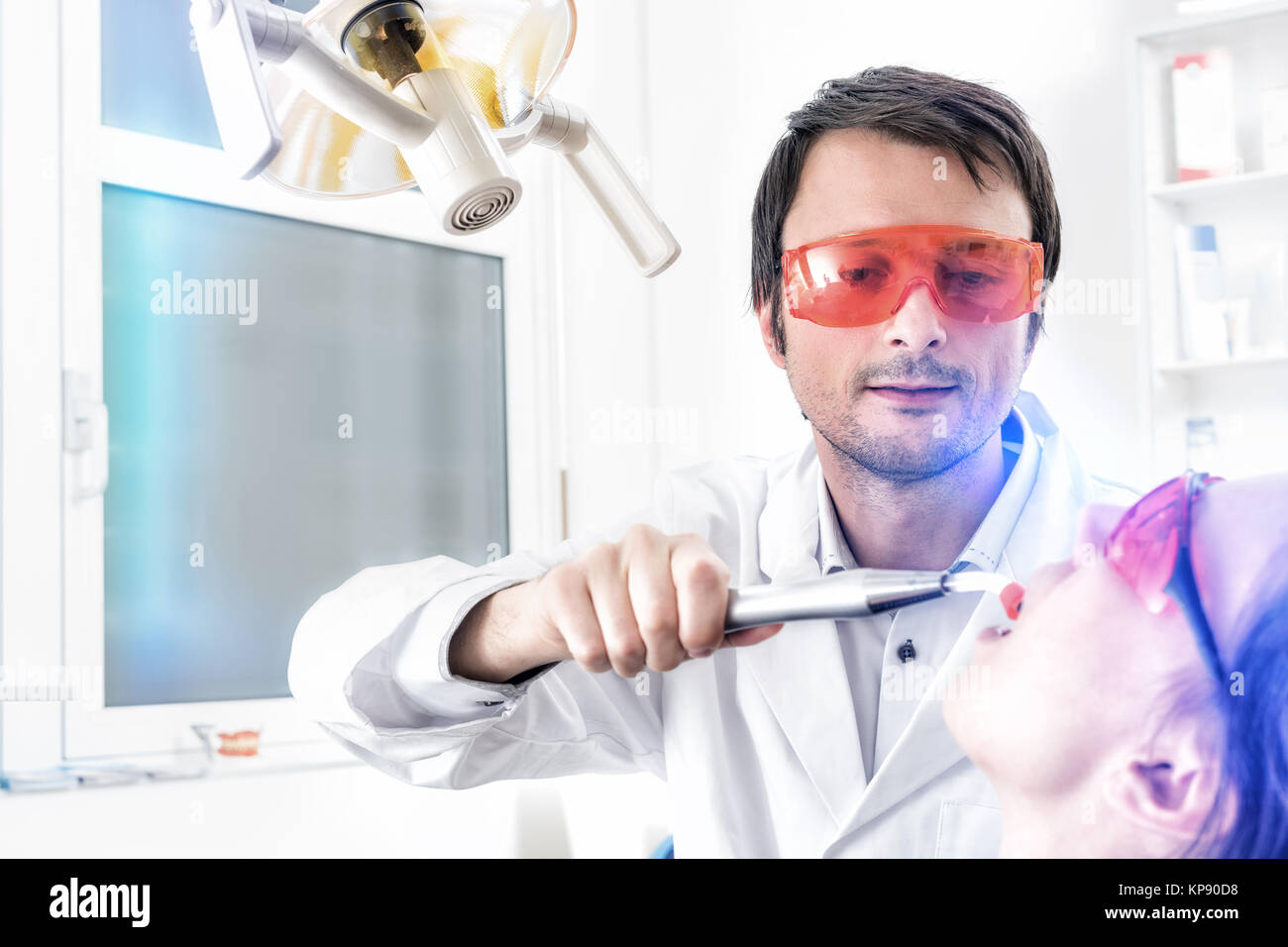 Bright light laser tooth hi-res stock photography and images - Alamy
