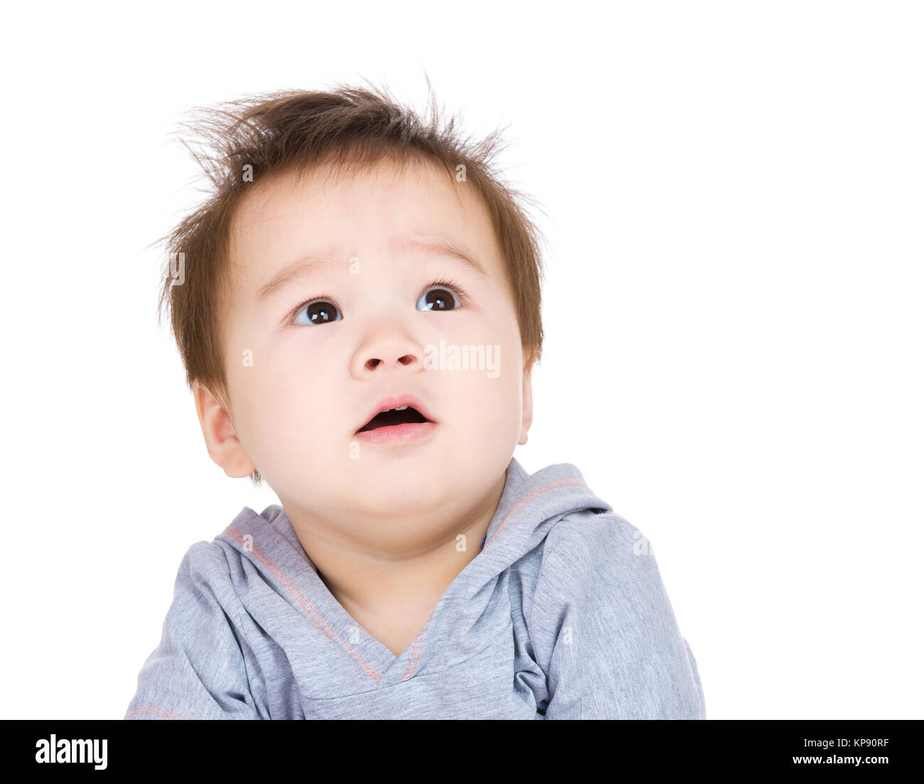Baby boy looking up Stock Photo - Alamy