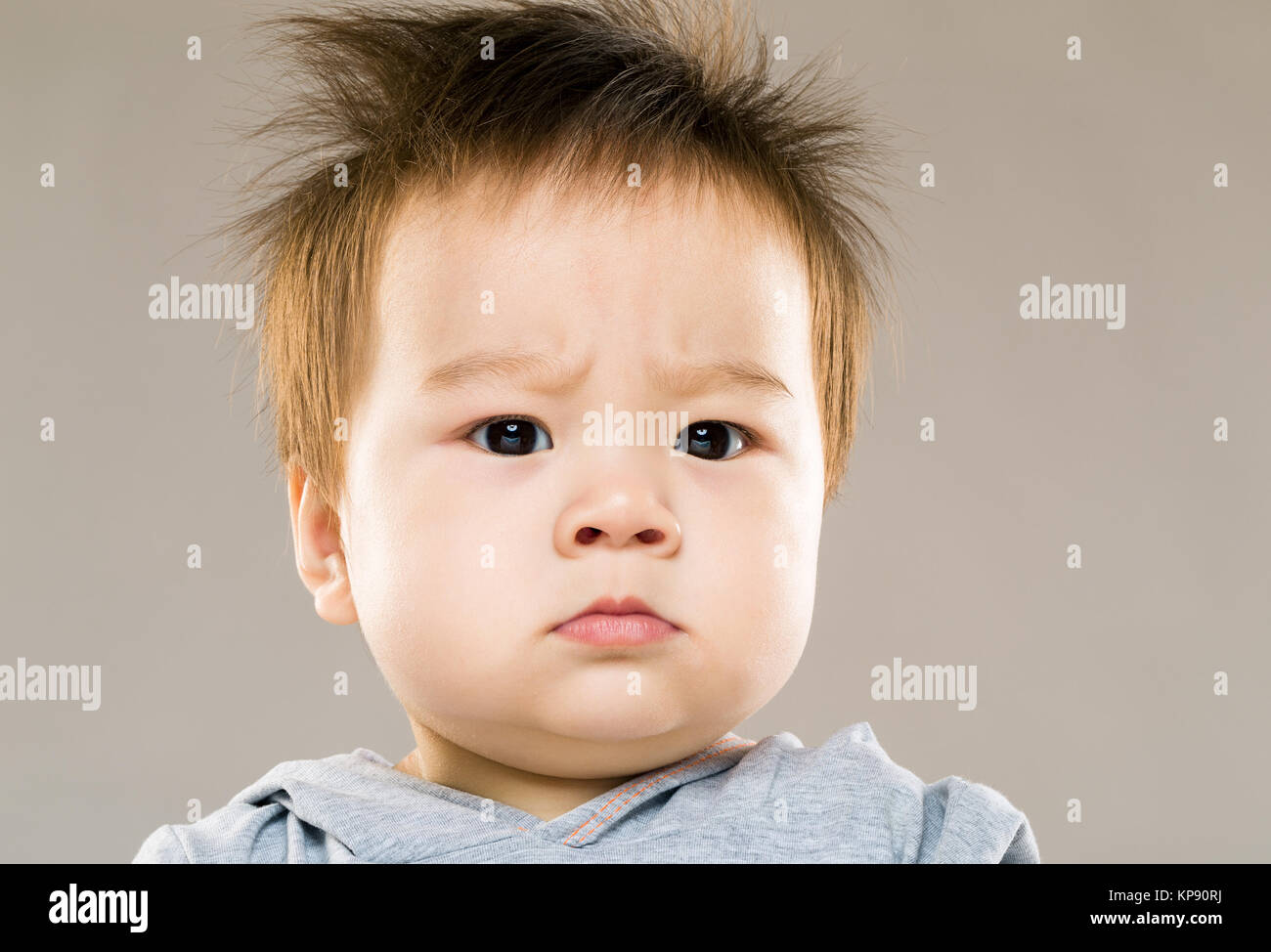 Angry baby picture hi-res stock photography and images - Alamy