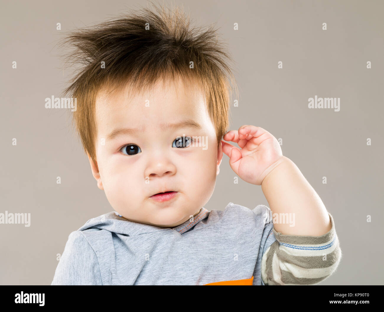 Cute baby boy salute Stock Photo - Alamy