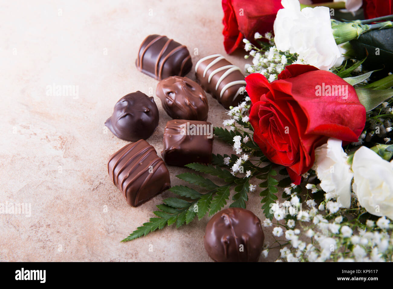 Roses and Candy Stock Photo - Alamy