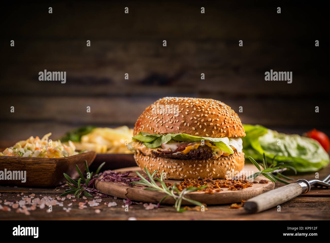 Burger in sesame bun Stock Photo - Alamy