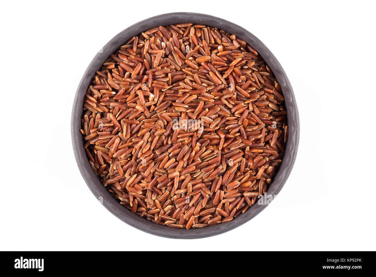 Heap of red rice Stock Photo - Alamy