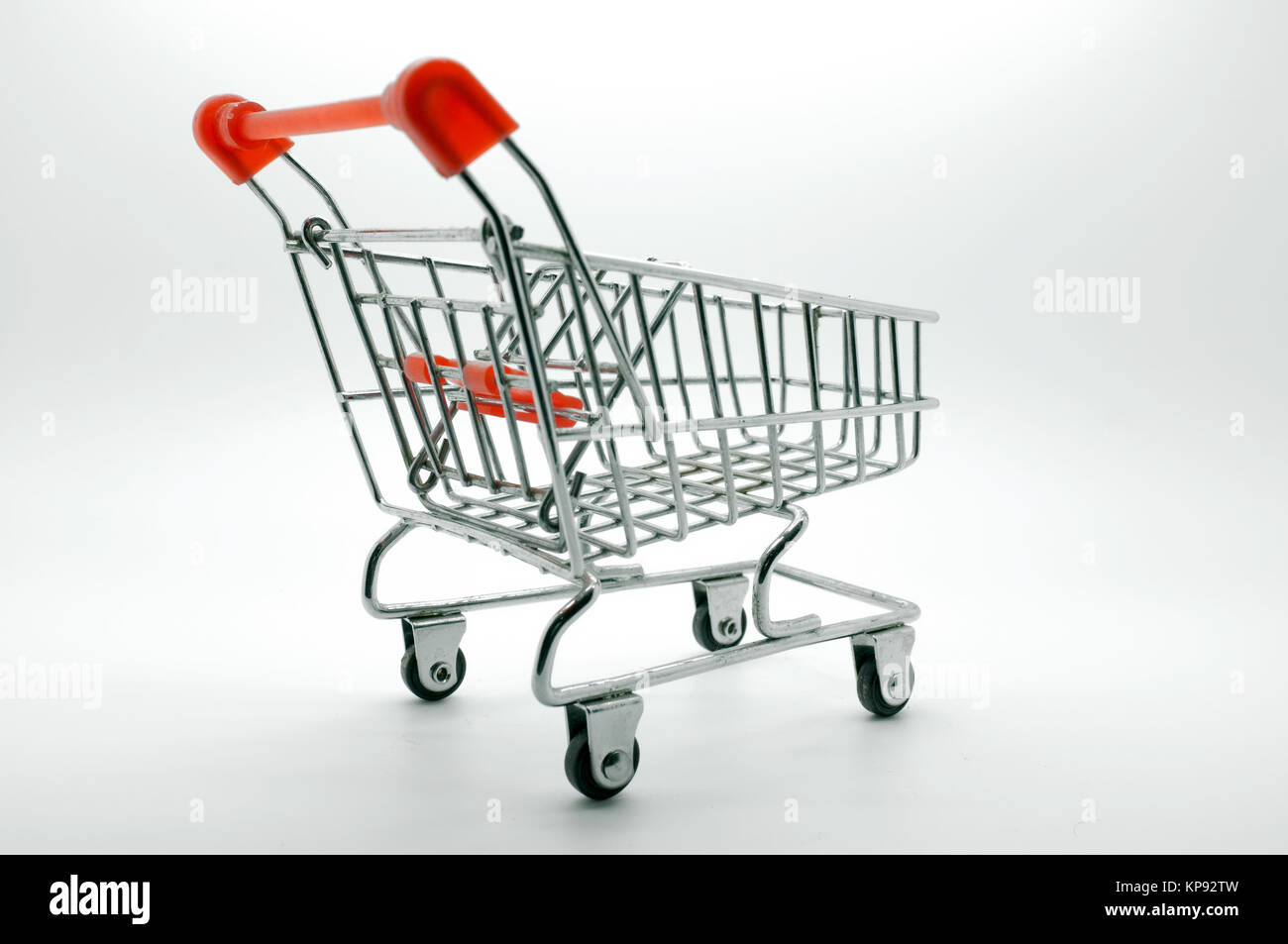 Empty shopping cart, side view, on white background Stock Photo - Alamy