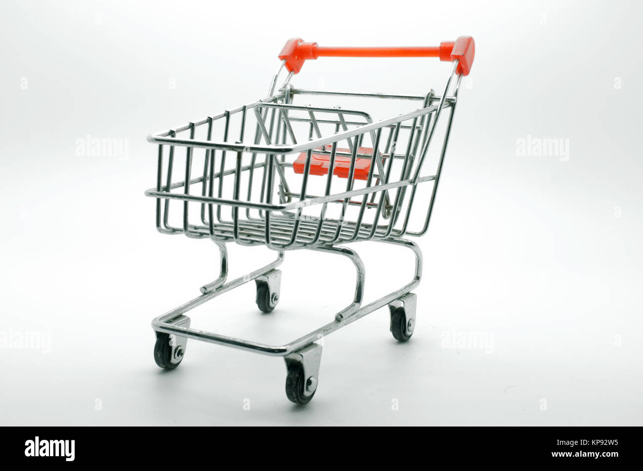 Empty shopping cart, side view, on white background Stock Photo - Alamy