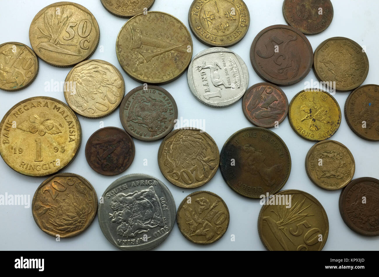 Pile coins globe hi-res stock photography and images - Alamy