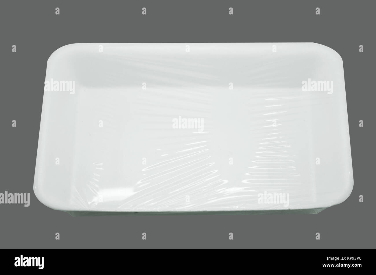 Wrapped white styrofoam food tray Stock Photo - Alamy