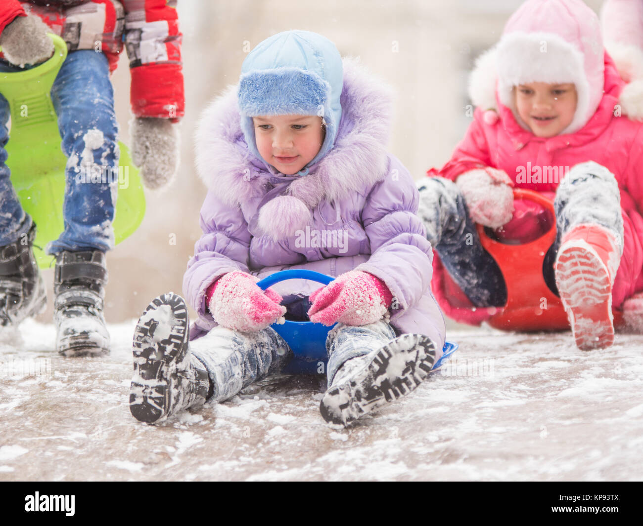 Girls rolling down hill hi-res stock photography and images - Alamy
