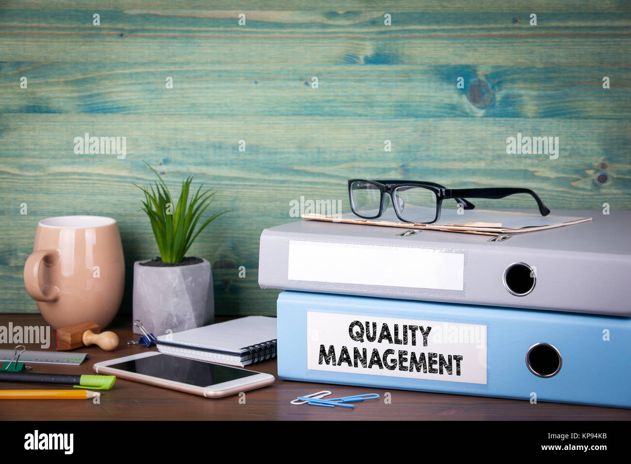 quality management concept. Binders on desk in the office. Business ...