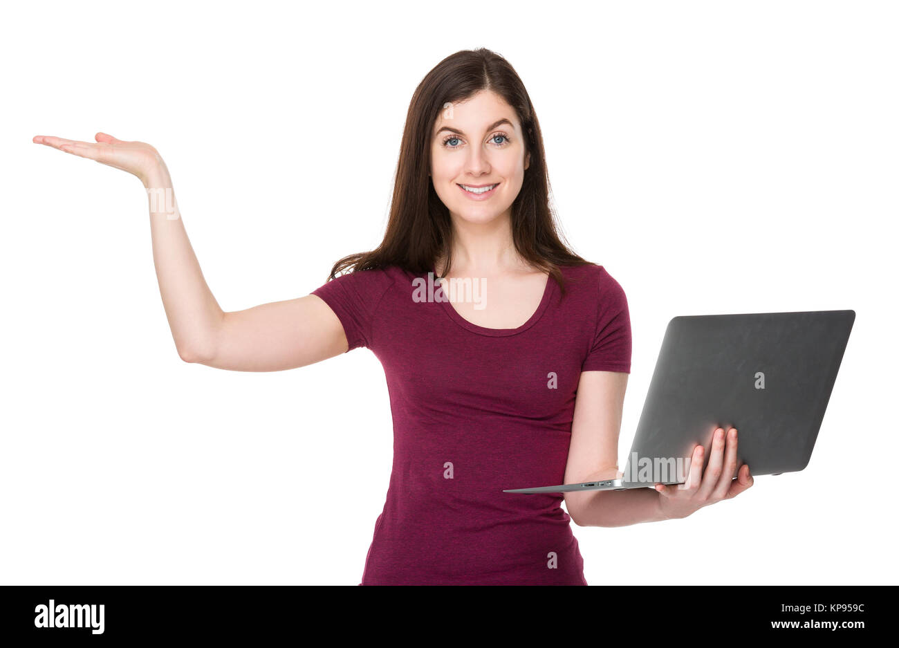Woman hold with laptop computer and open hand palm Stock Photo - Alamy