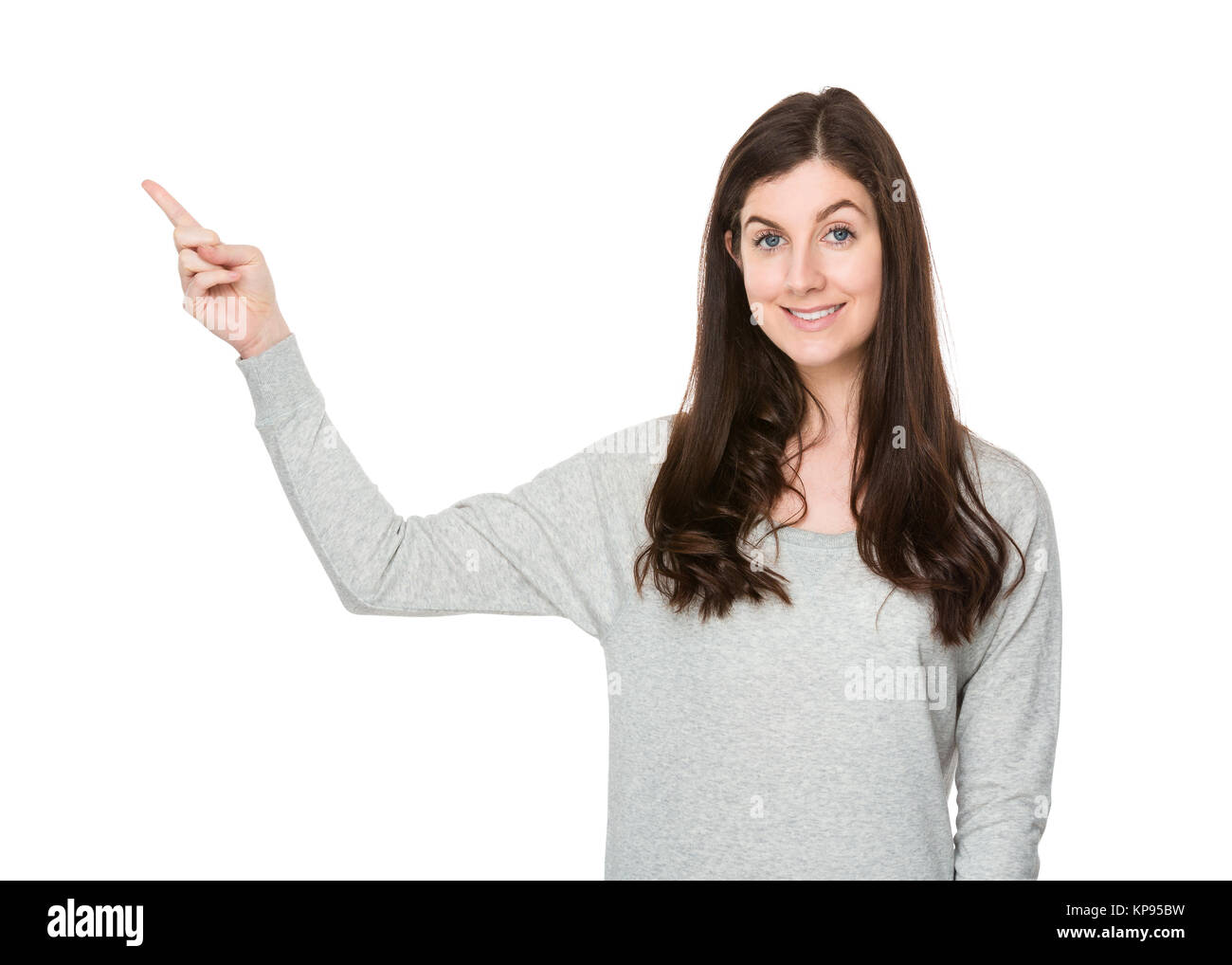 Young woman with finger point up Stock Photo - Alamy