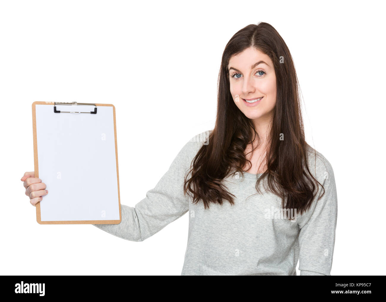 Young woman showing the clipboard Stock Photo - Alamy