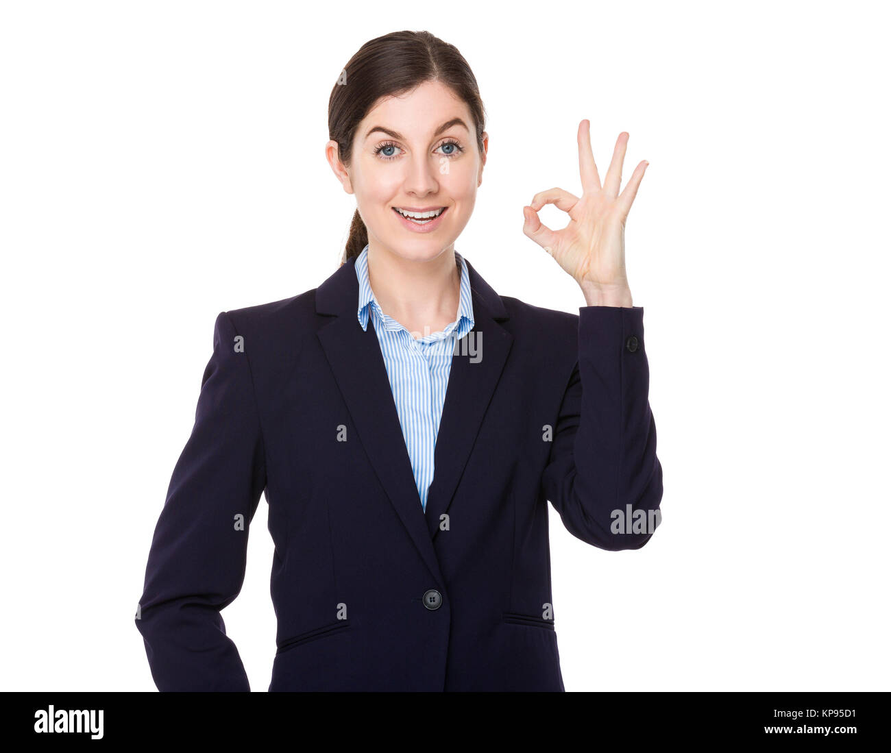 Businesswoman showing ok sign gesture Stock Photo - Alamy