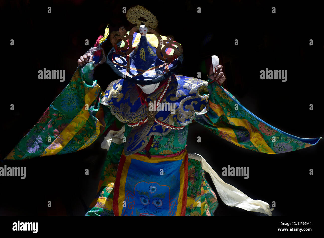 Religious dance tibetan monk in ethnic dress with ritual objects in his ...