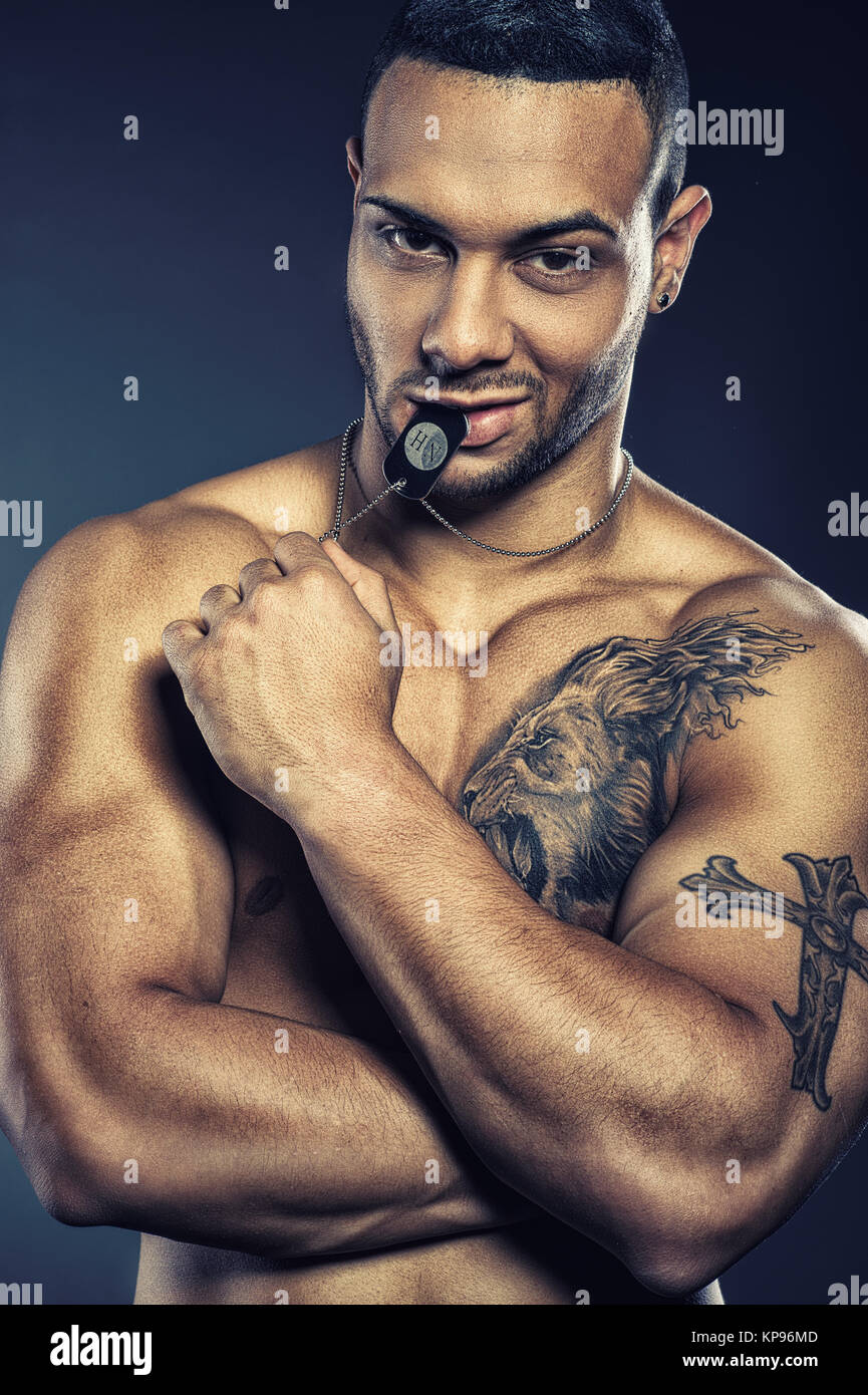 athletic man with muscles and defined body Stock Photo - Alamy