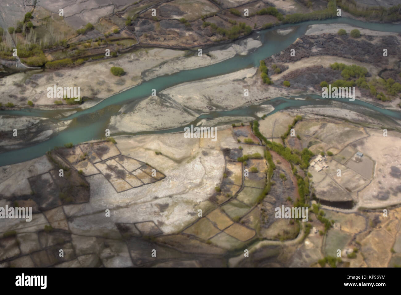The river, photographed from a height: in the floodplain fields and ...
