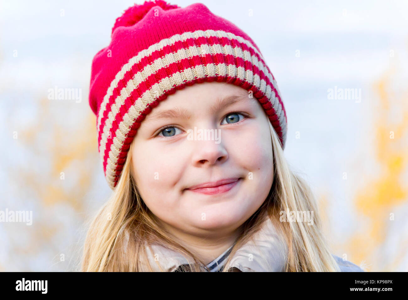 Cute girl in red hat Stock Photo - Alamy