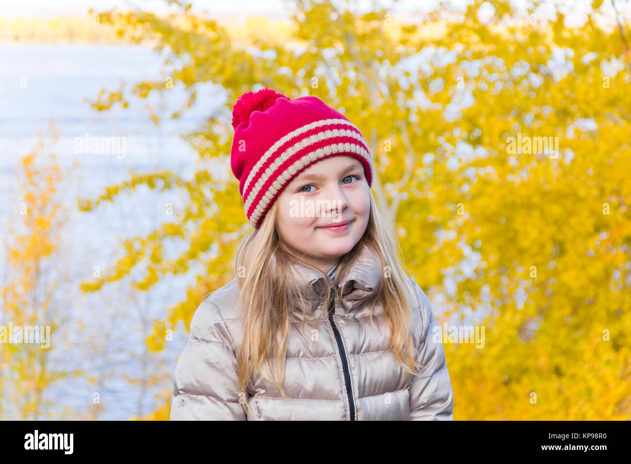 Cute girl in red hat Stock Photo - Alamy