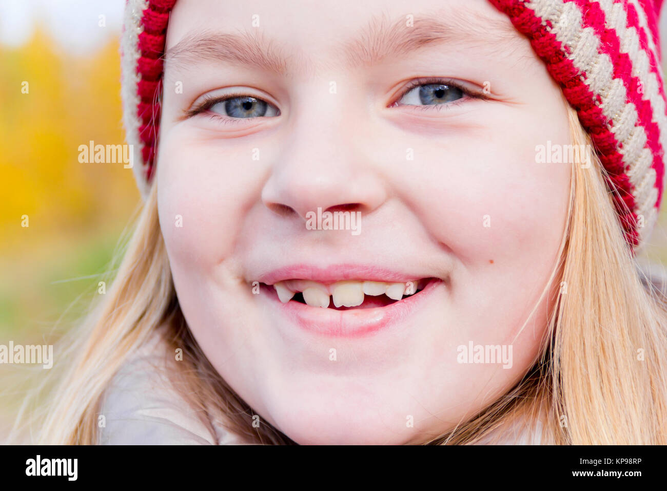 Cute girl in red hat Stock Photo - Alamy
