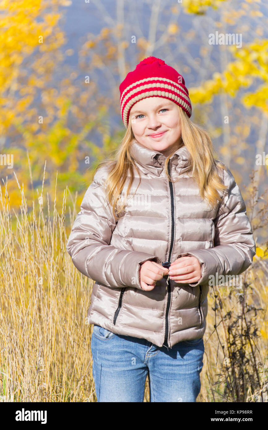 Cute girl in red hat Stock Photo - Alamy