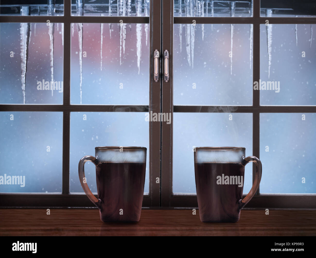 Two mugs with coffee on a background of a winter window. Snow falling ...
