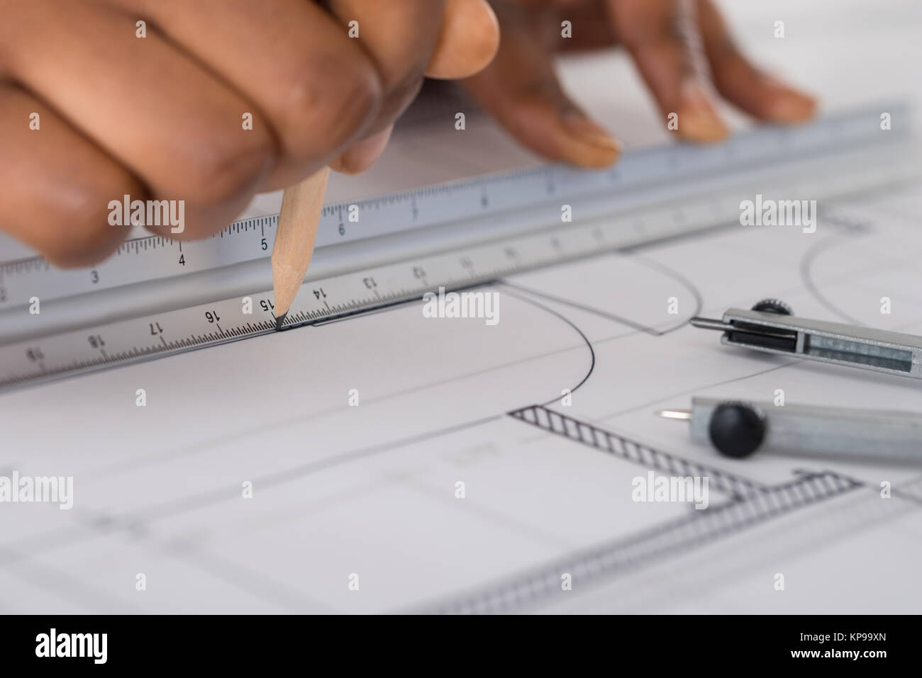 Person's Hand Drawing Blue Print Stock Photo - Alamy