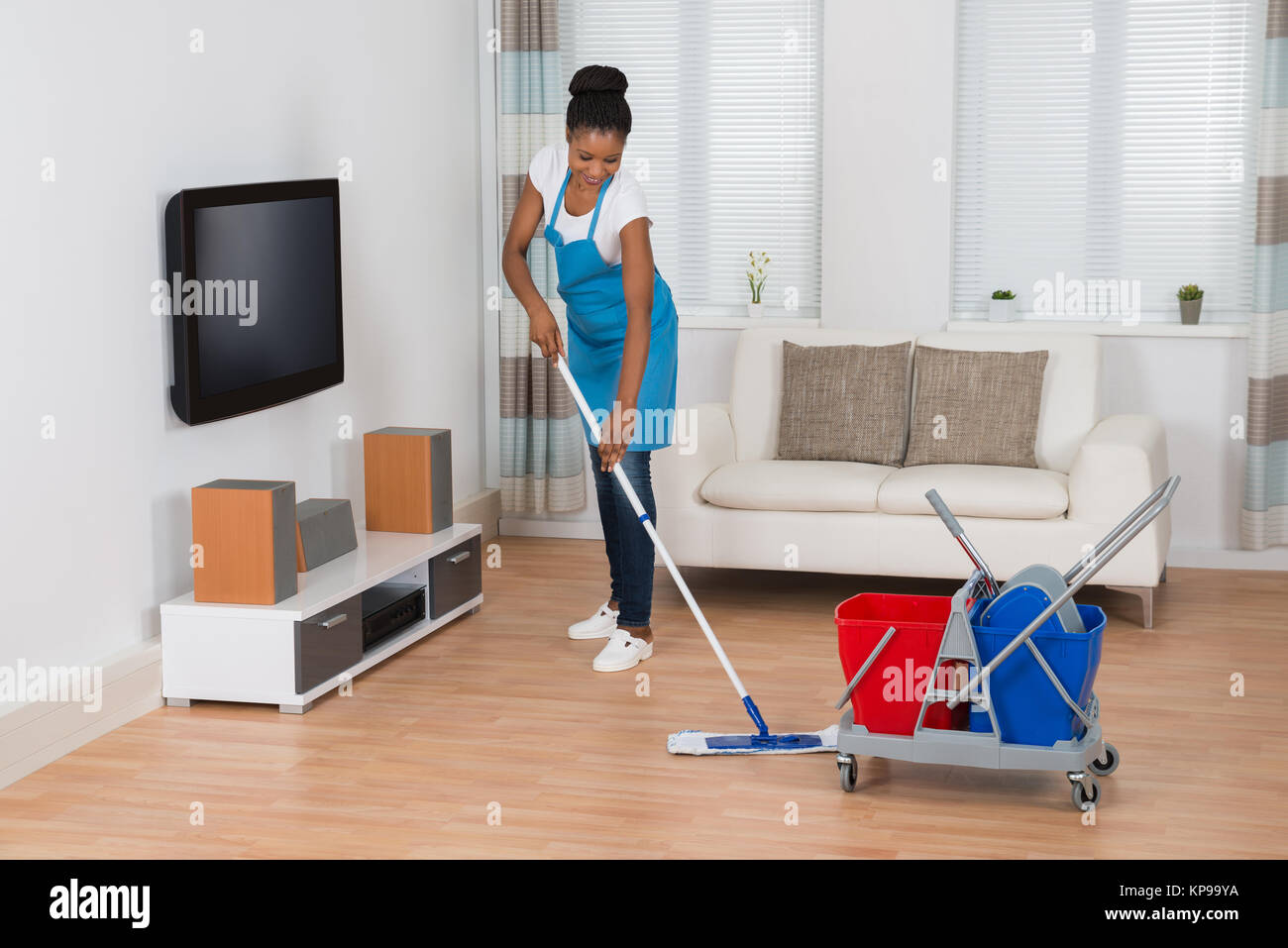 Woman Cleaning Floor Stock Photo - Alamy