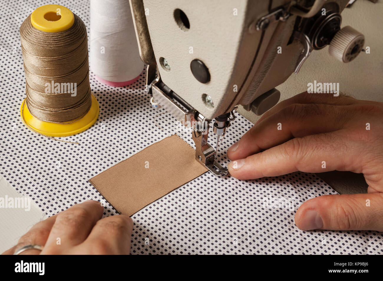 Hand sewing clothes vintage hi-res stock photography and images - Alamy