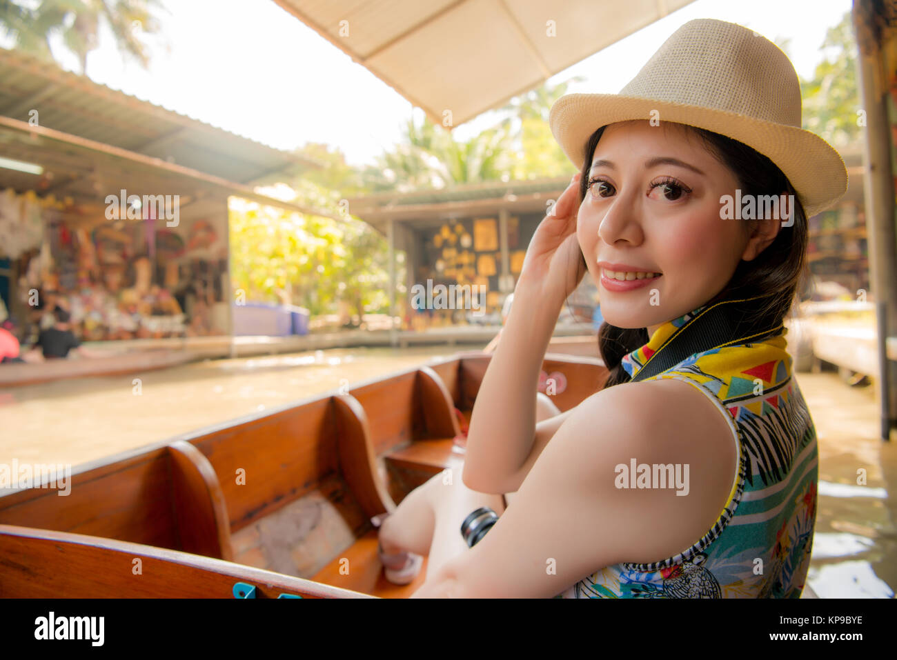 smiling beauty travel girl turn around to looking at camera when she ...