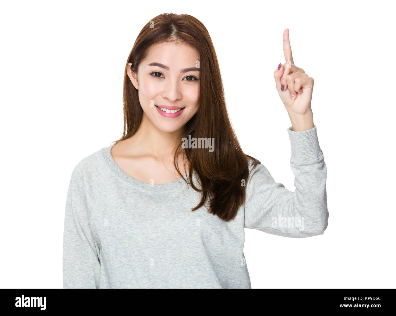Asian Woman with finger showing up Stock Photo - Alamy