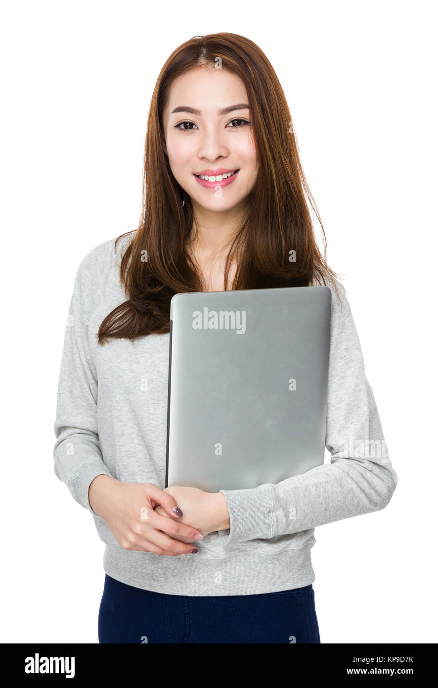 Asian Woman hold with laptop computer Stock Photo - Alamy