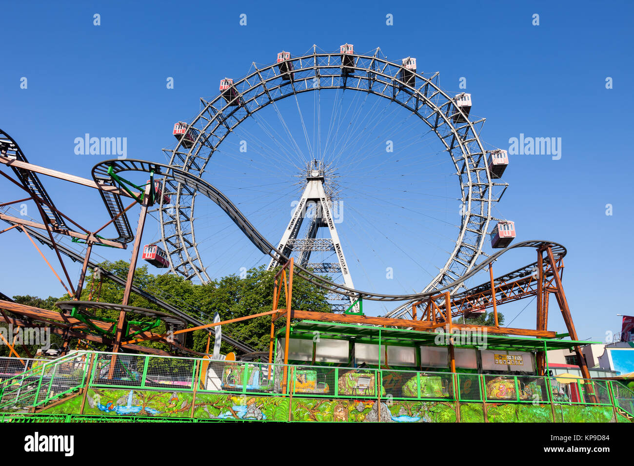 Dizzy Mouse roller coaster and Giant Ferris Wheel in Prater amusement ...