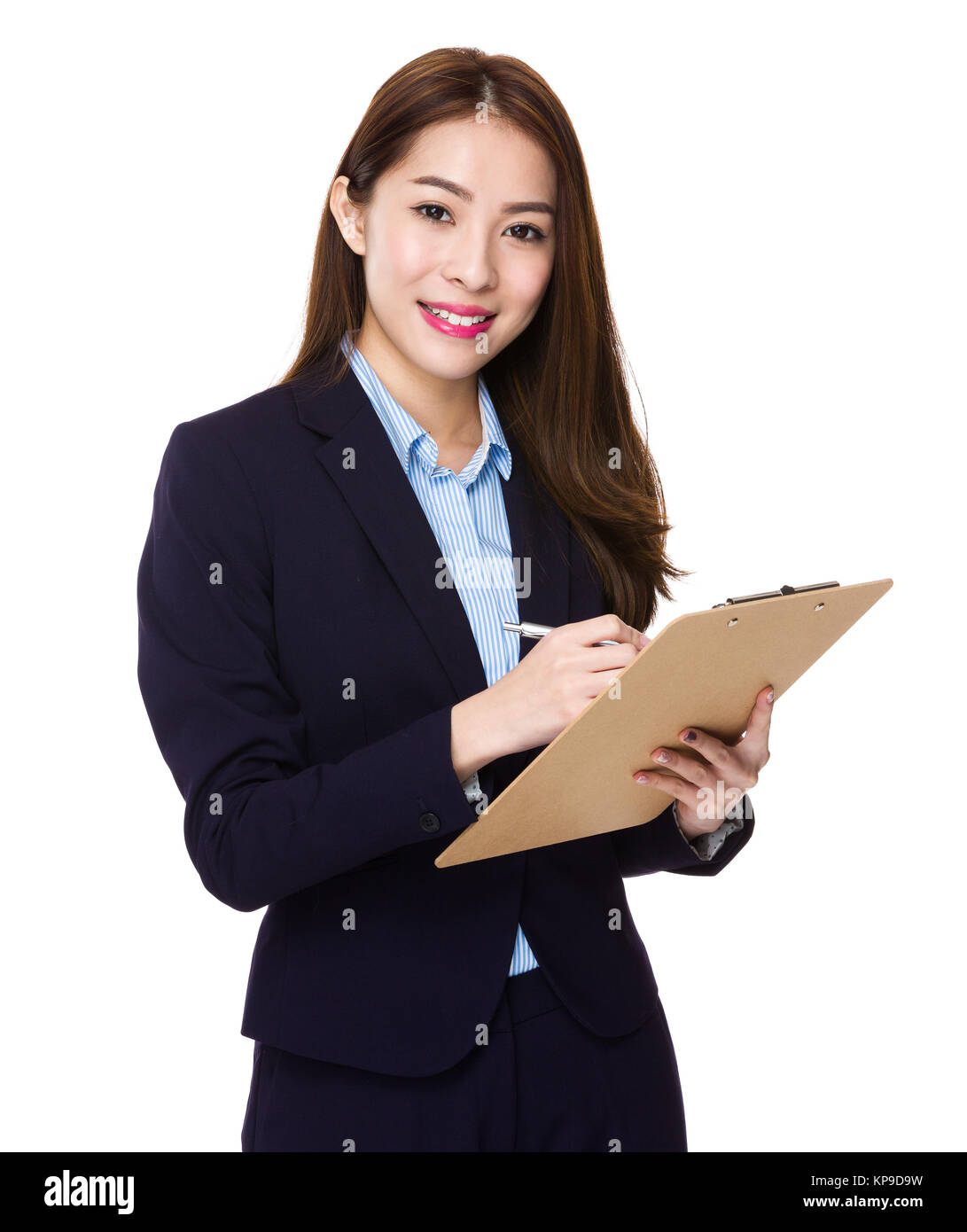 Young Businesswoman take note on clipboard Stock Photo - Alamy
