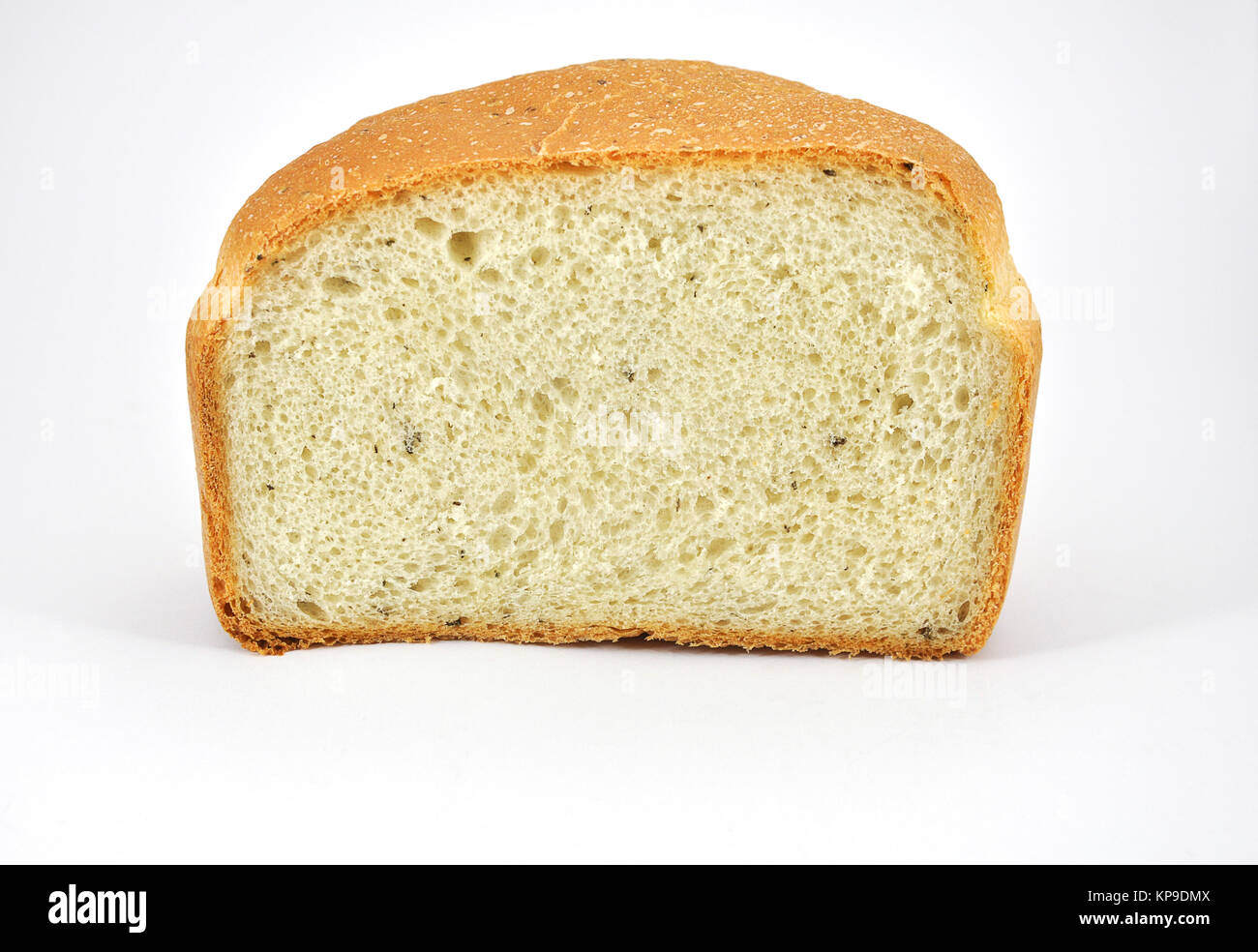 Half of white bread with herbs and spices Stock Photo - Alamy