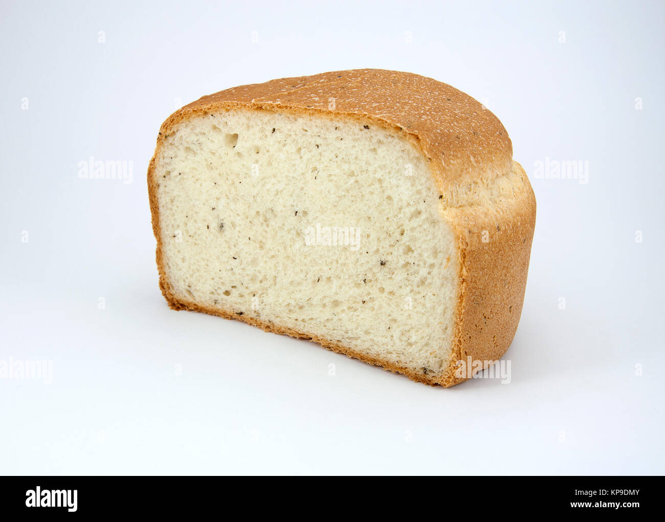 Half of round white bread with herbs and spices Stock Photo - Alamy