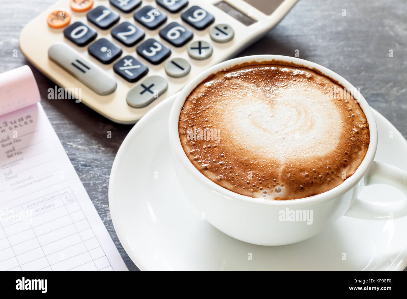 Coffee cup on work station Stock Photo - Alamy