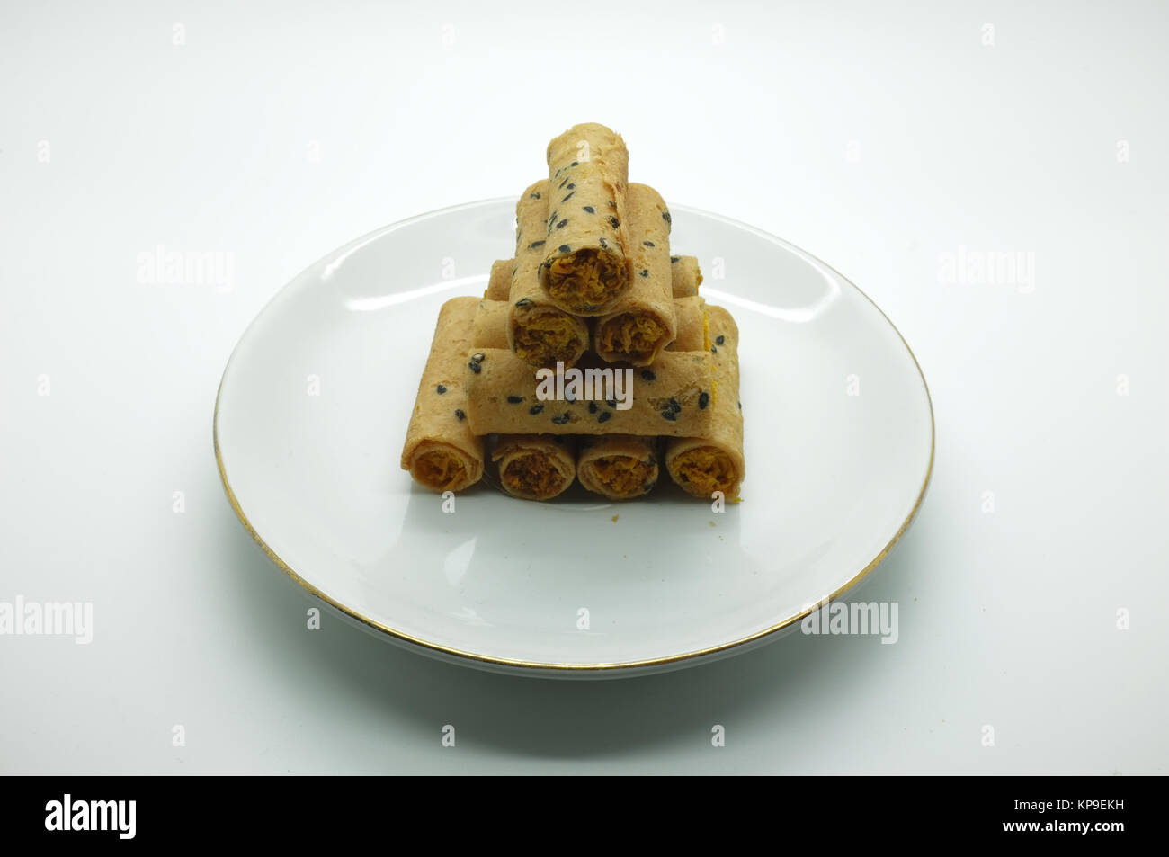 Thai rolled wafer stacking on dish Stock Photo - Alamy