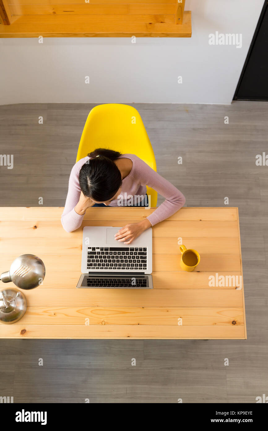 Top view of woman looking at the laptop computer Stock Photo - Alamy