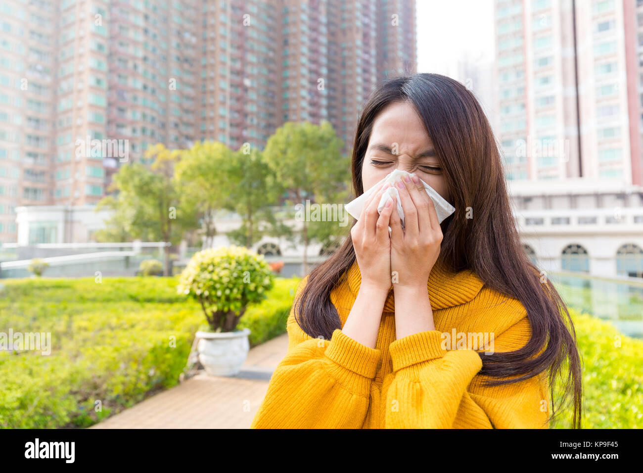 Young Woman runny nose Stock Photo - Alamy