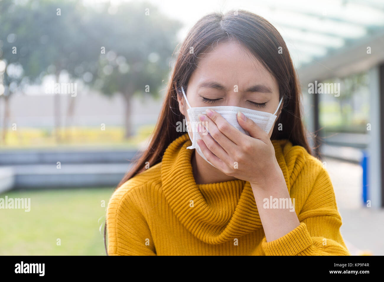 Asian Young woman wearing face mask Stock Photo - Alamy
